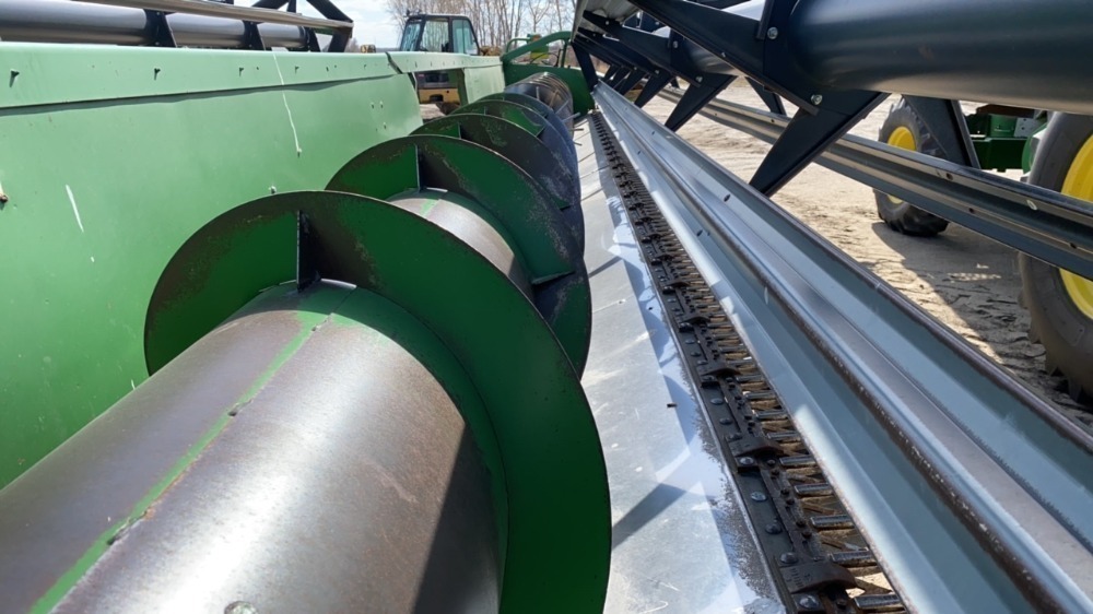 30ft JD 930 Rigid platform header on 2 wheel transport, f50